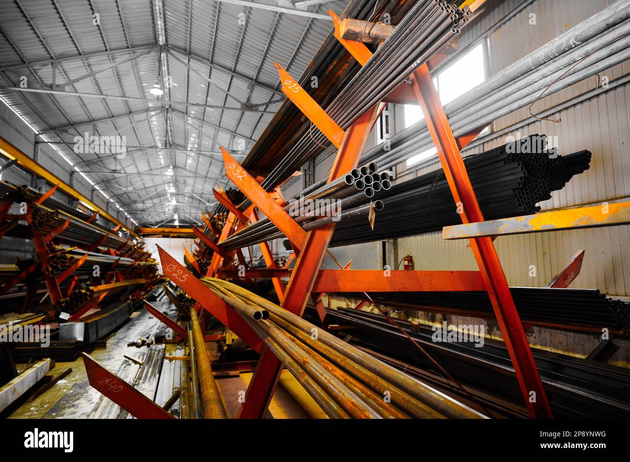 Stack of cold rolled tubes in industrial complex storage Stock Photo ...
