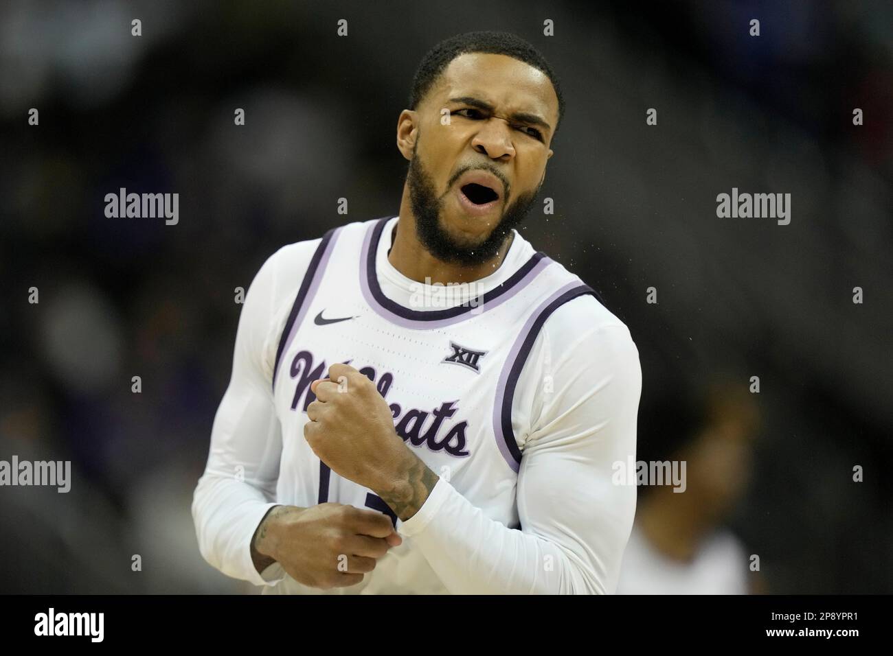Kansas State guard Desi Sills celebrates after making a basket during ...