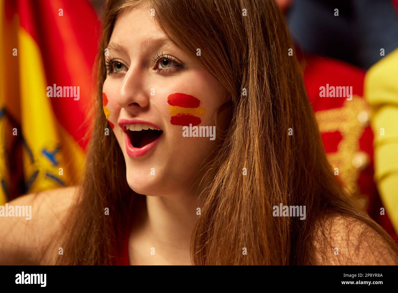Close-up image of girl, football, soccer fans emotionally watching ...