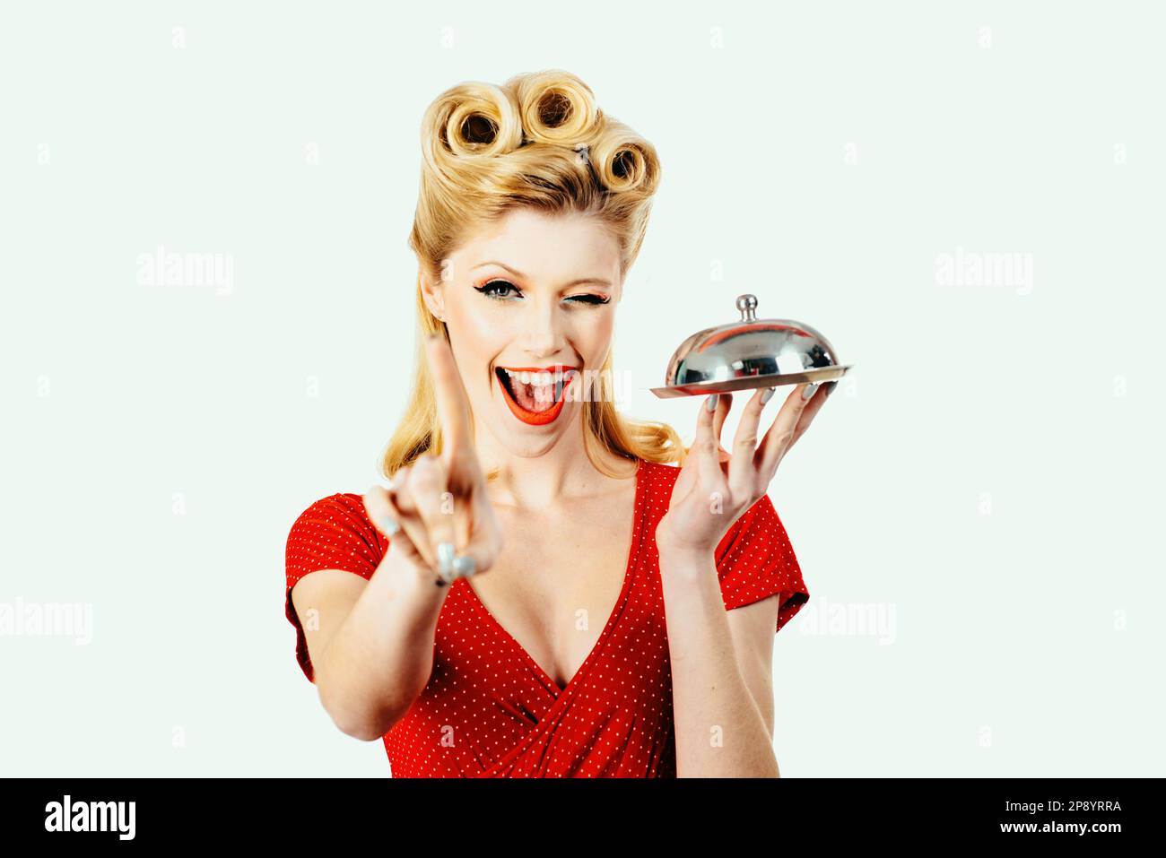 Pinup girl with service tray. Serving presentation concept. Restaurant ...
