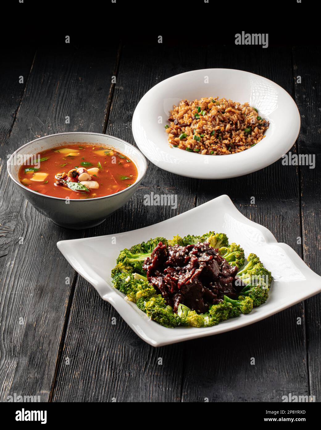 Chinese lunch with rice marinated beef and soup Stock Photo - Alamy