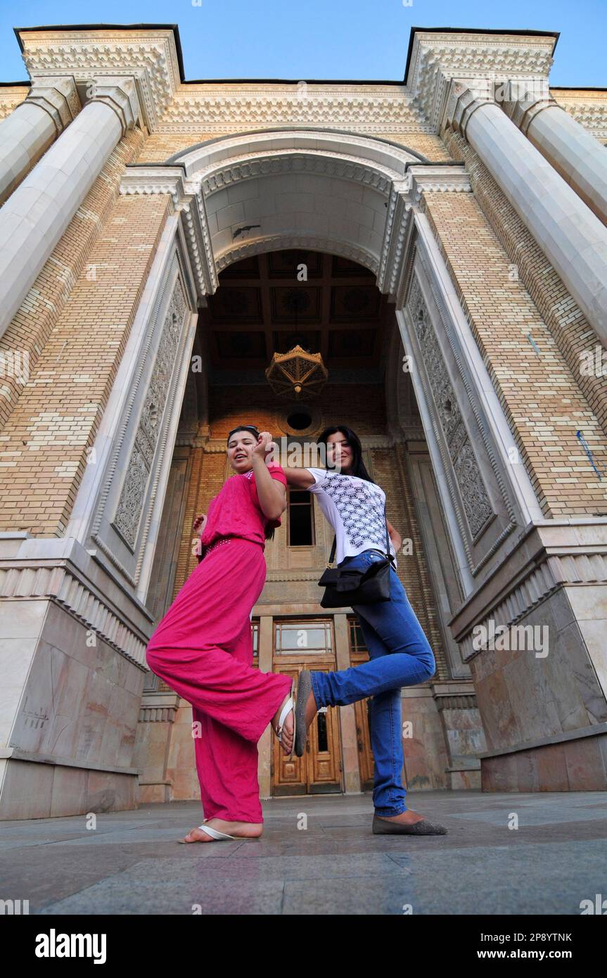 Uzbek teenage girls posing for a picture in front of the The Bolshoi ...