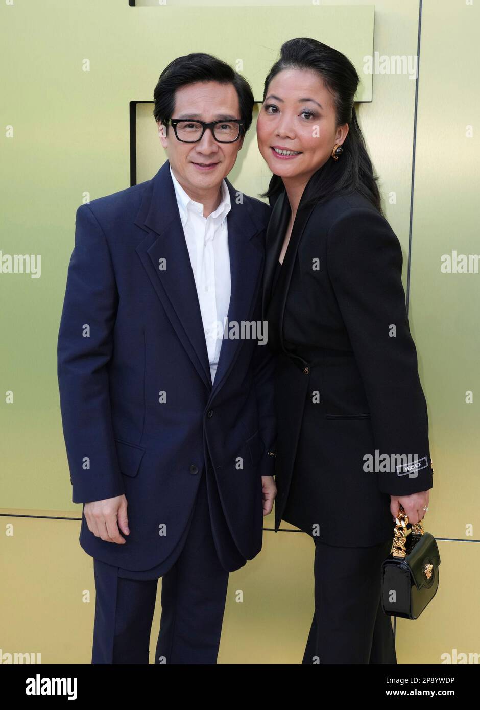 Ke Huy Quan, left, and Echo Quan arrive at the Versace Fall/Winter ...