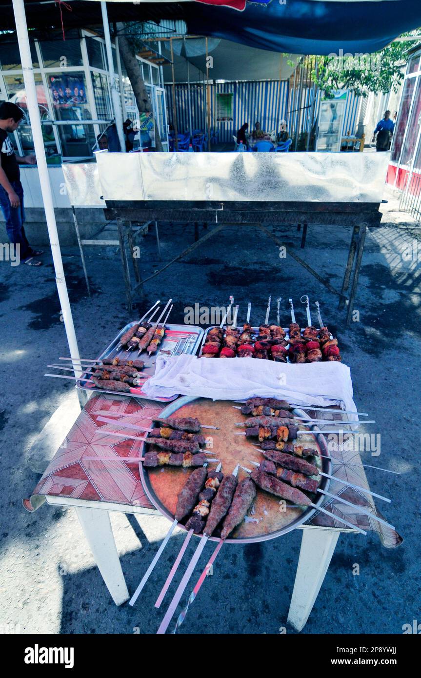 Uzbek man grilling hi-res stock photography and images - Alamy