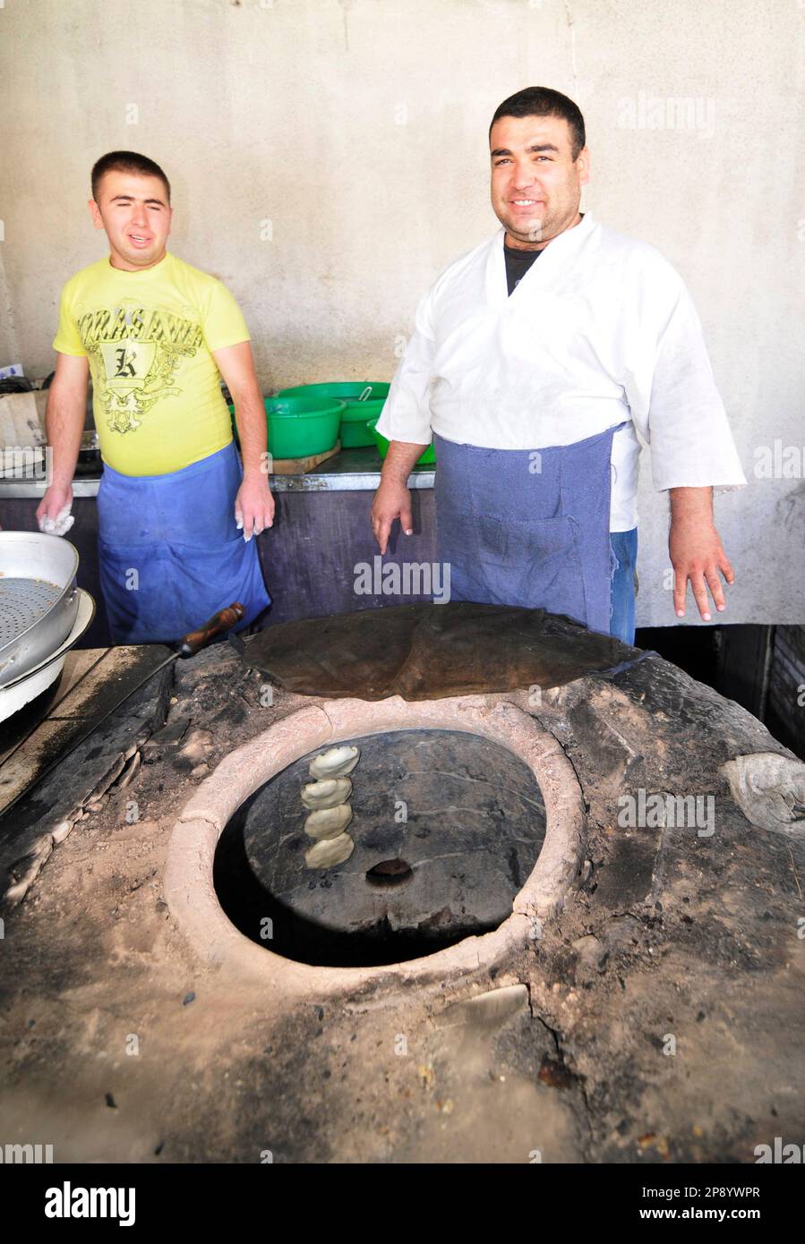 Uzbek Samsa ( flaky baked meat buns ) baked in a tandoor oven is a ...