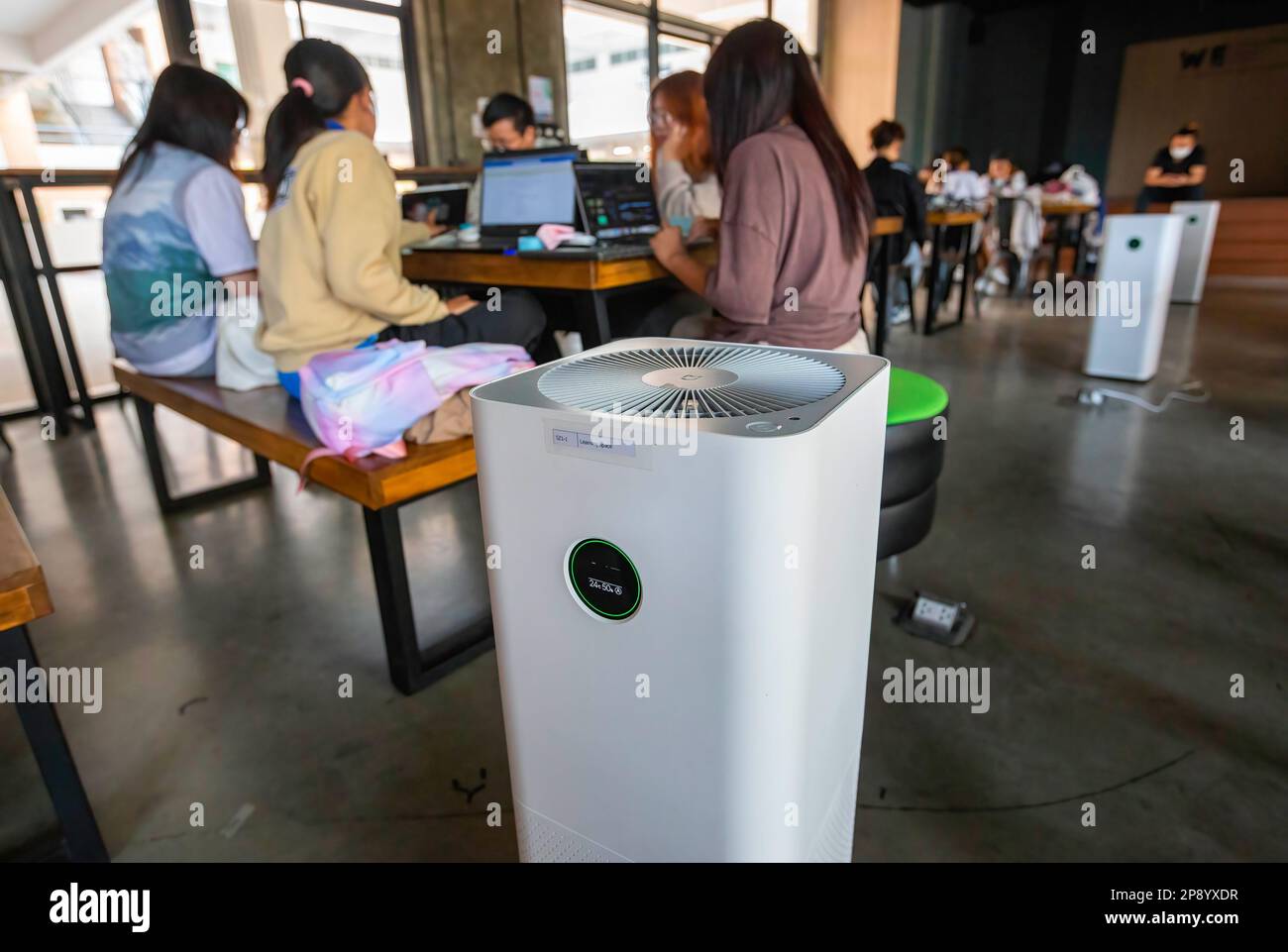 Thailand. 09th Mar, 2023. College students use an air purifier to ...