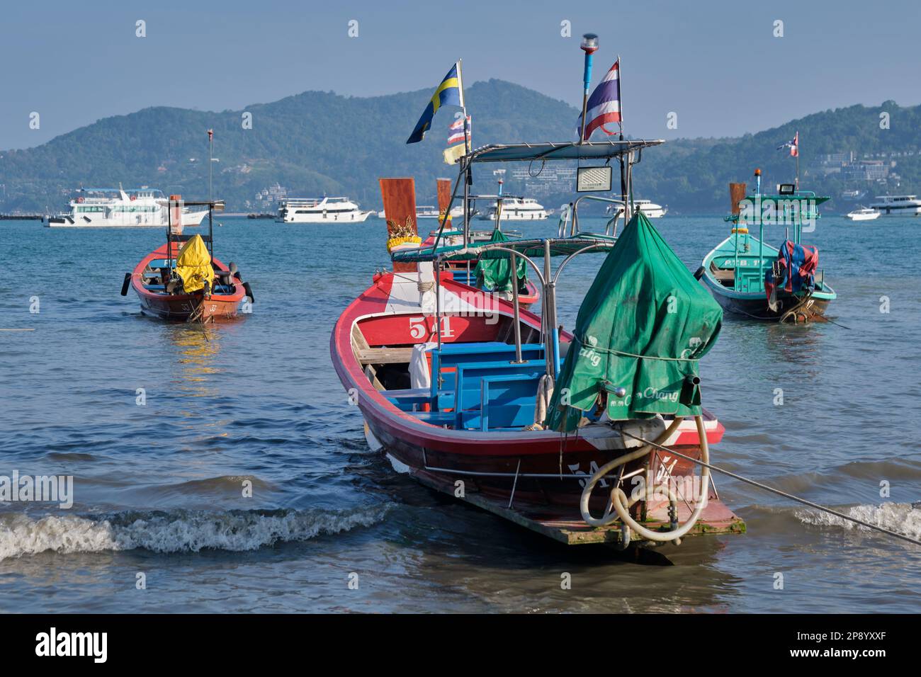 Tourist excursion boats anchored off Patong Beach, Phuket, Southern ...