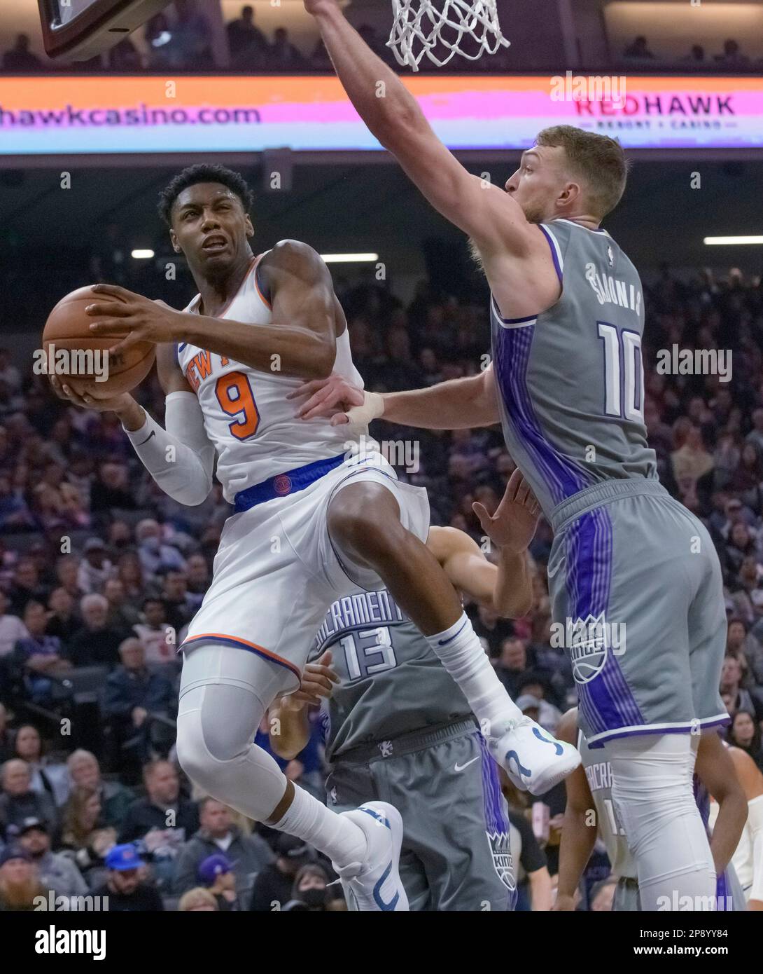 New York Knicks guard RJ Barrett (9) drives to the basket as Sacramento ...