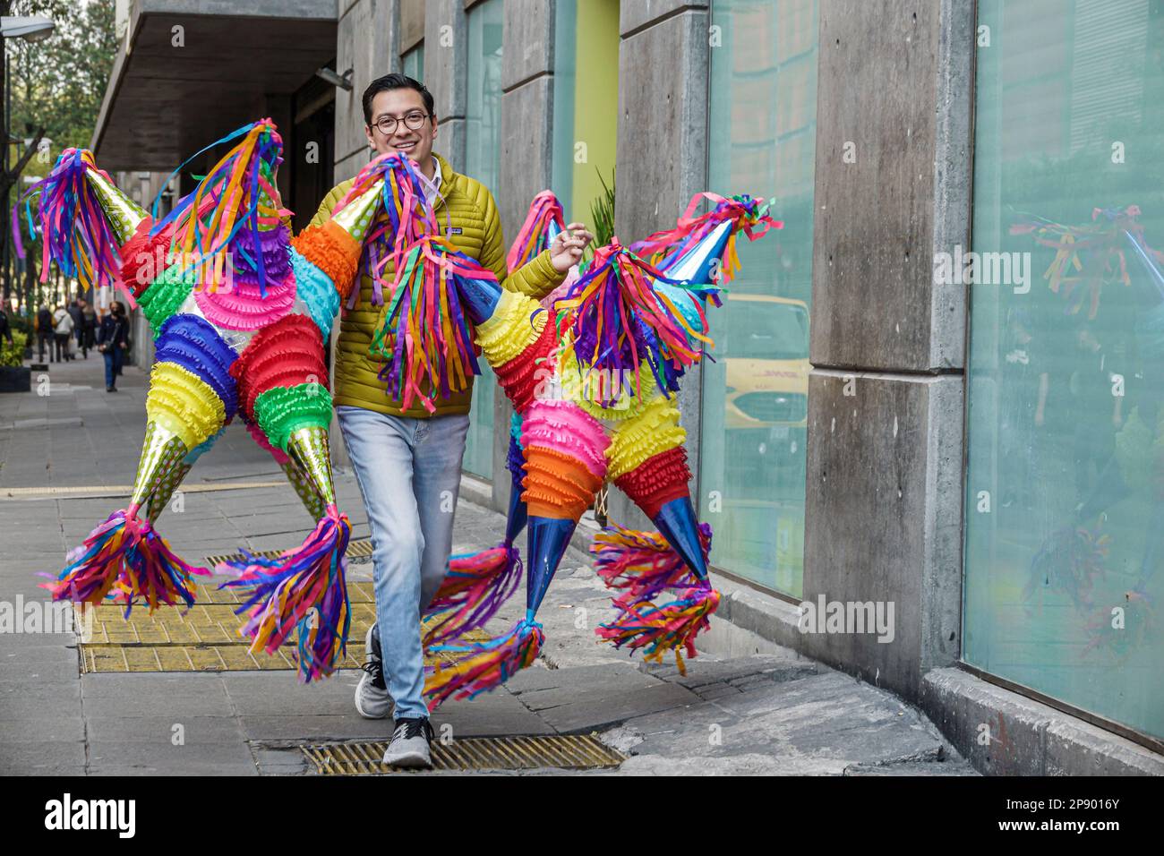 Pinata pinatas carrying hi-res stock photography and images - Alamy