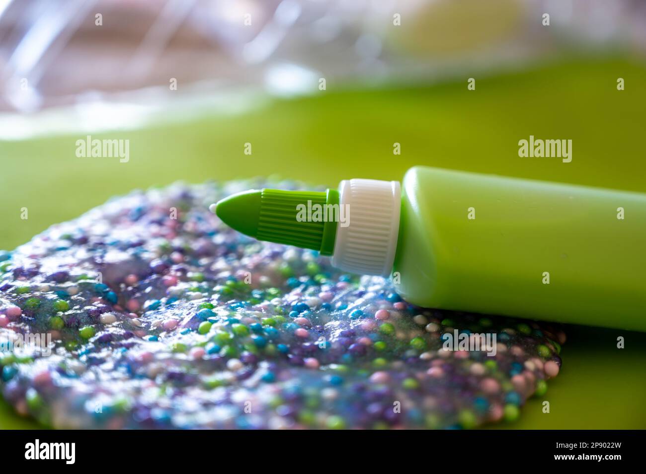 Home made slime with microplastic and glue Stock Photo - Alamy