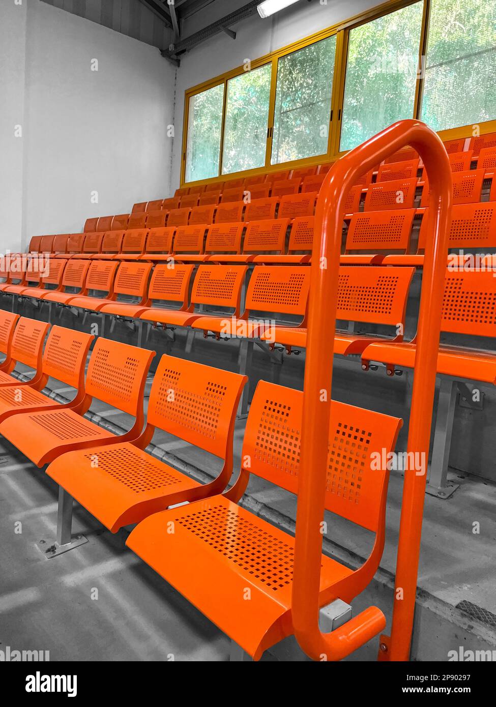 View of orange seats in stadium Stock Photo - Alamy