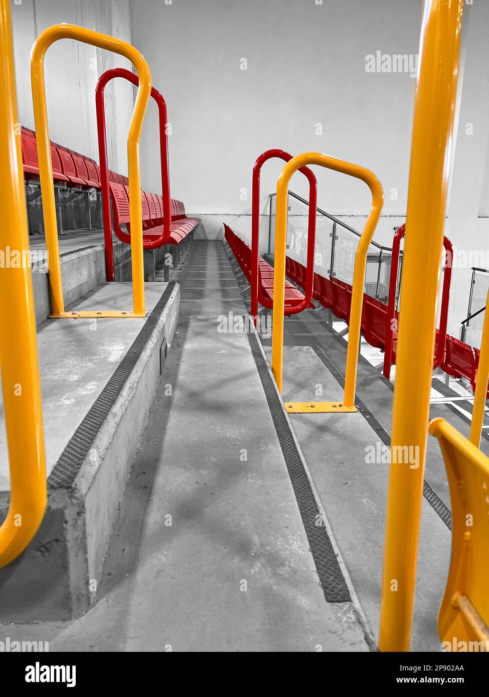 View of steps and red seats in stadium Stock Photo - Alamy