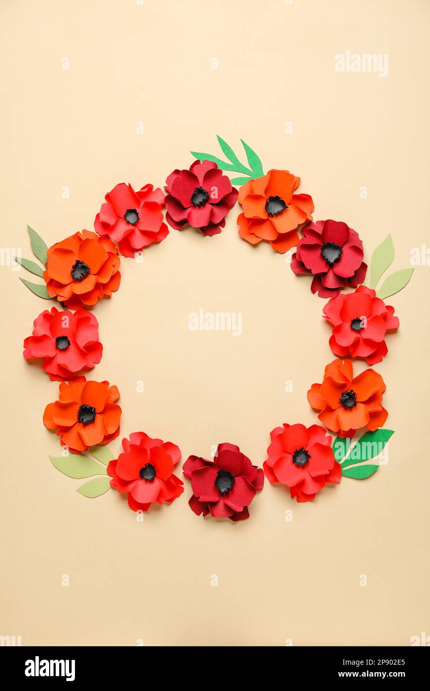 Frame made of paper poppy flowers with leaves on beige background Stock ...