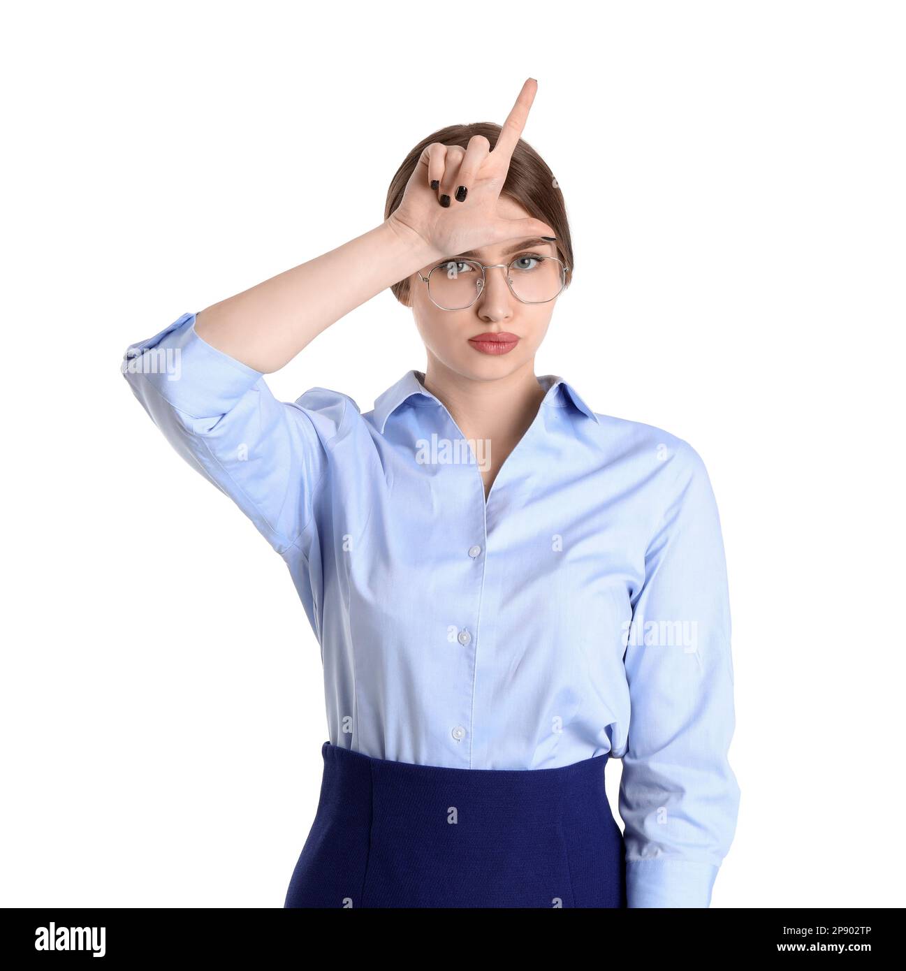 Young businesswoman showing loser gesture on white background Stock ...