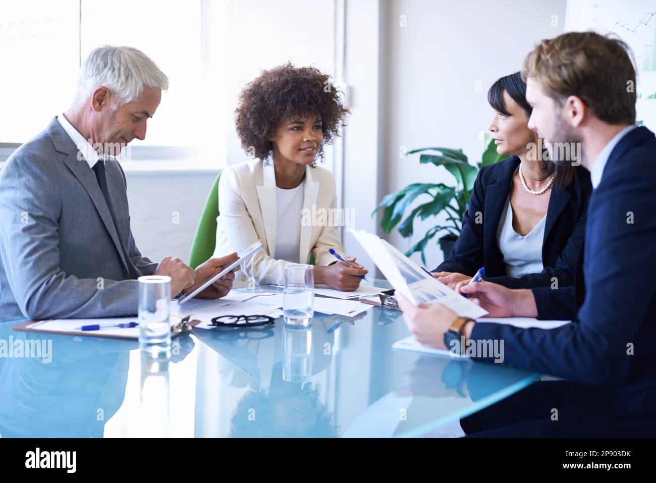 Getting the job done with teamwork. a group of business colleagues ...