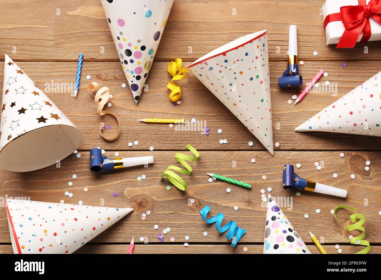 Composition with different party decor on wooden background Stock Photo ...