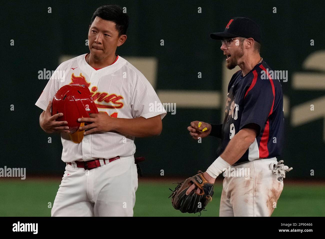 China's Chang Ray and Czech Republic's second baseman Eric Sogard are ...