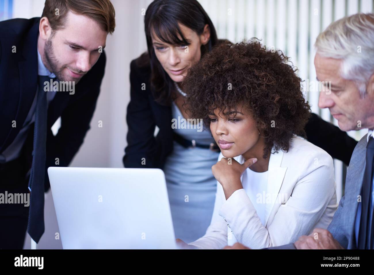 Getting the job done with teamwork. a group of business colleagues ...