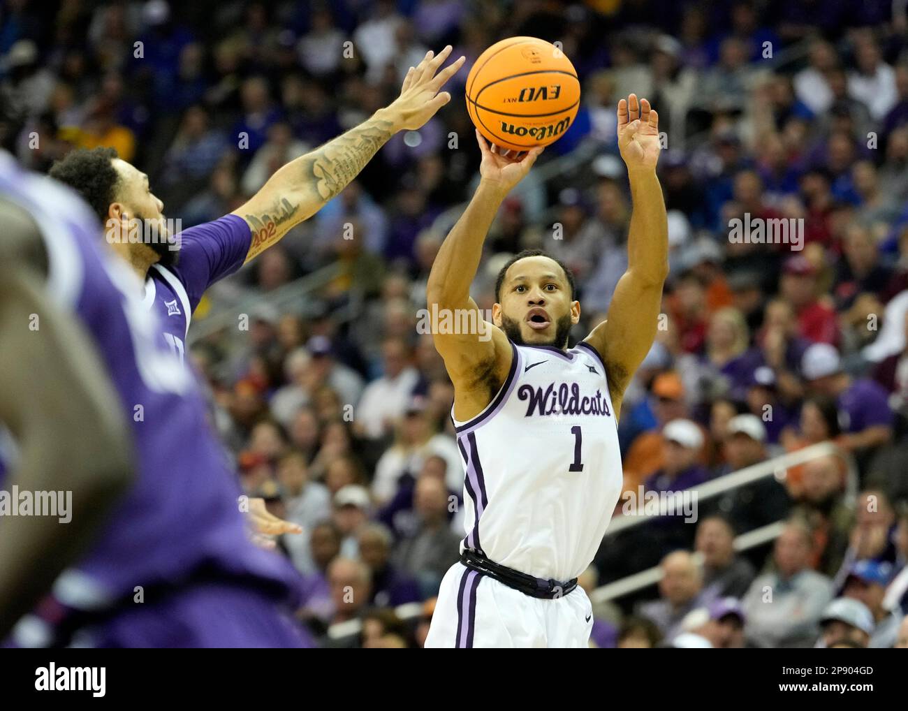 MAR 09 2023: Kansas State guard Markquis Nowell (1) launches a guarded ...