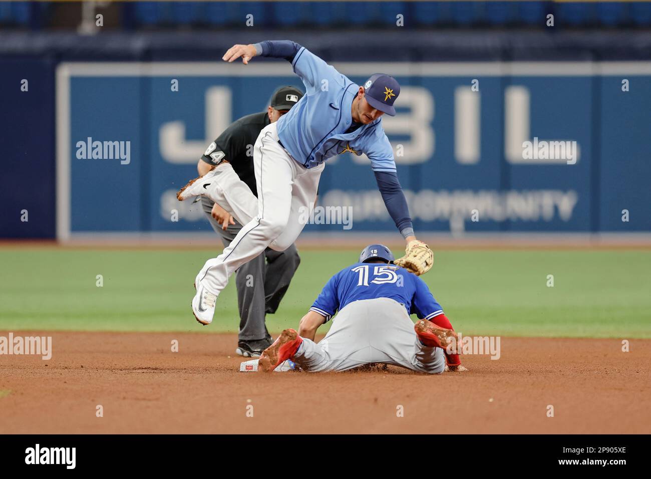 Toronto Blue Jays second baseman Whit Merrifield (15) slides safely ...