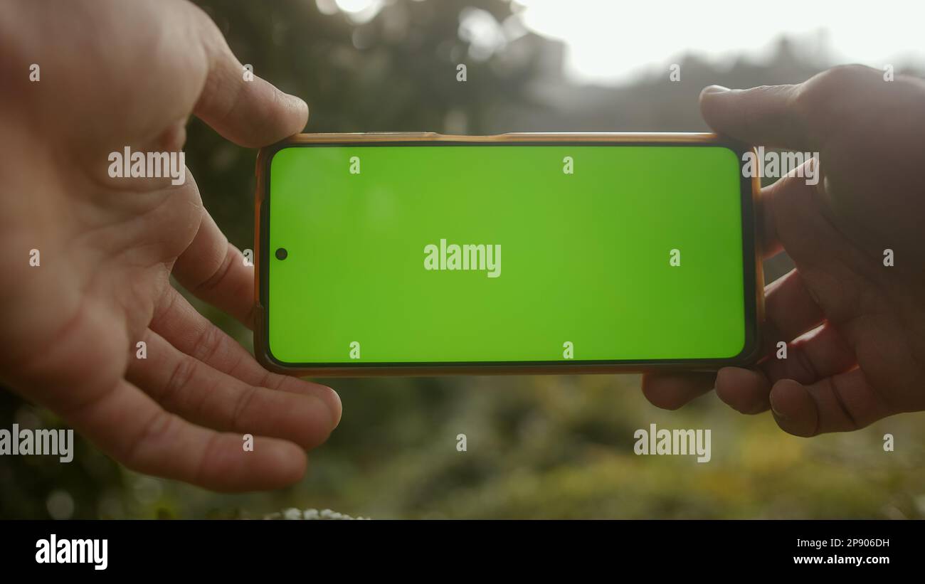 Green screen chroma key handheld hi-res stock photography and images ...