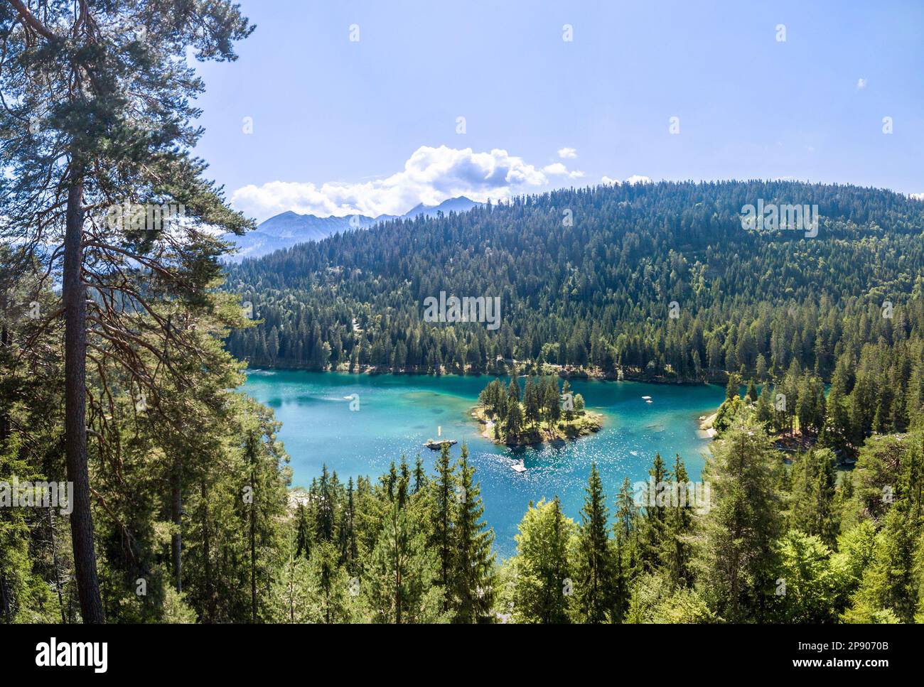 Aerial image of the turquoise Caumasee lake in the alpine mountains in ...