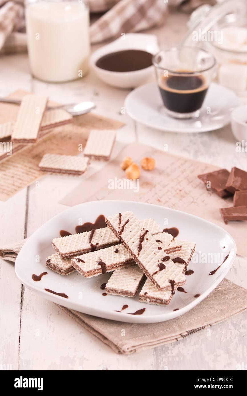 Neapolitan wafers filling with hazelnut-chocolate cream Stock Photo - Alamy