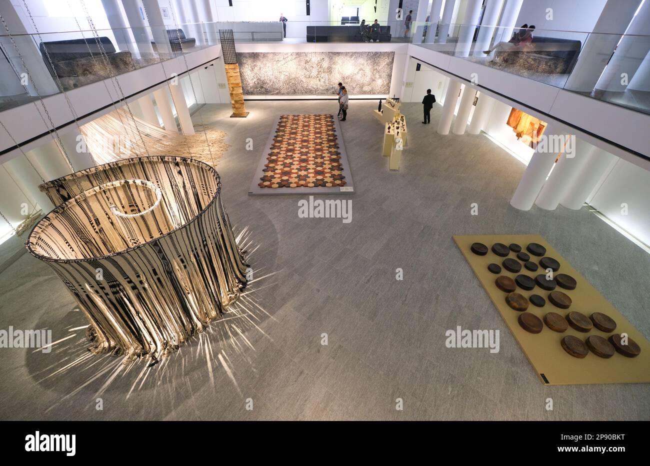 A downstairs, basement gallery room displaying a temporary group show ...