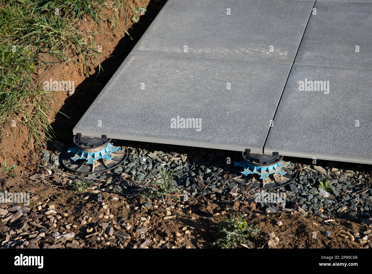 Exterior pavement tiles installation on the house terrace with ...