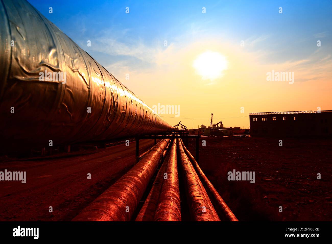 Oil pipes and valves Stock Photo - Alamy