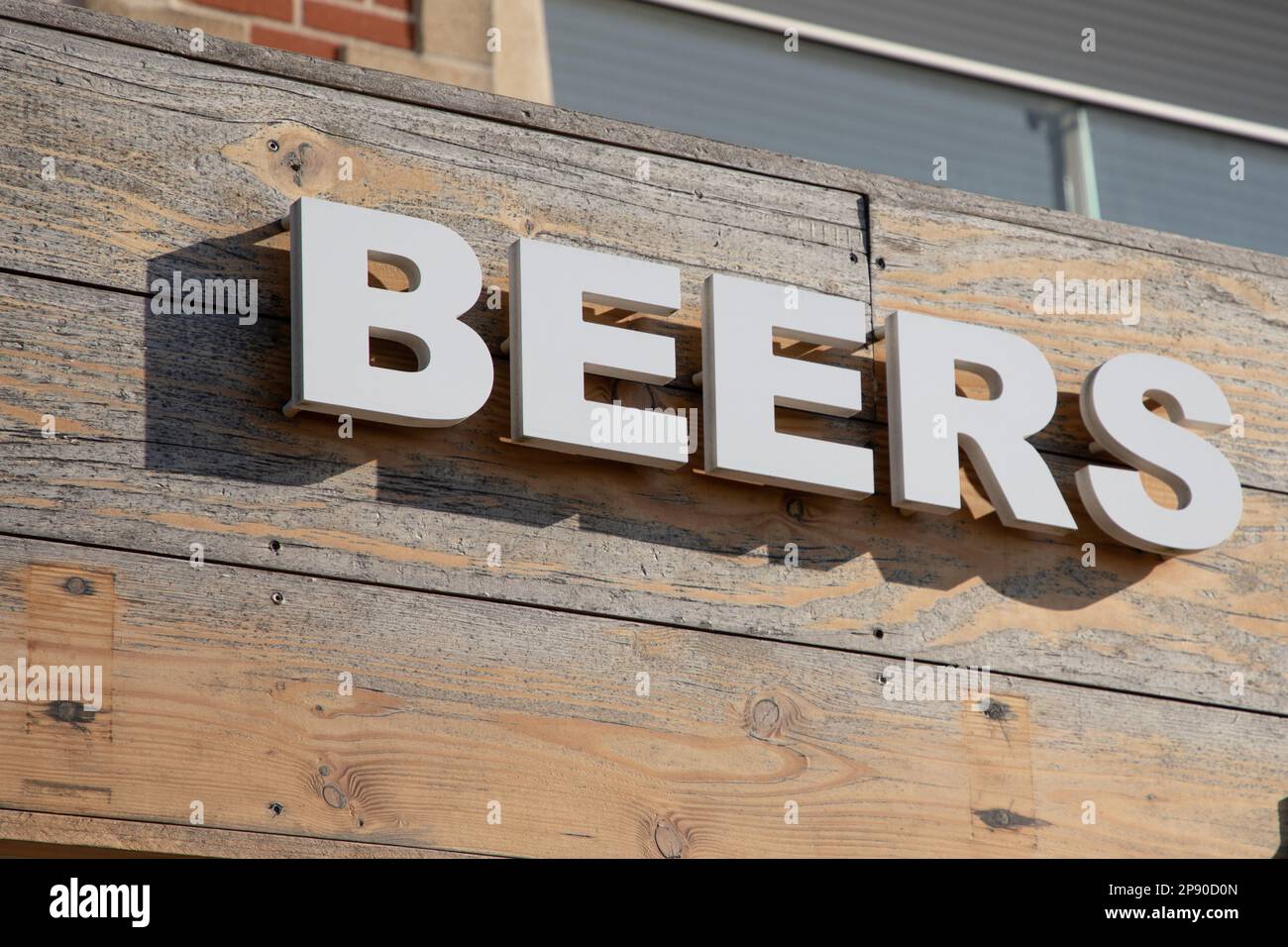 text pub beers sign on facade wall front building cafe bar entrance in ...
