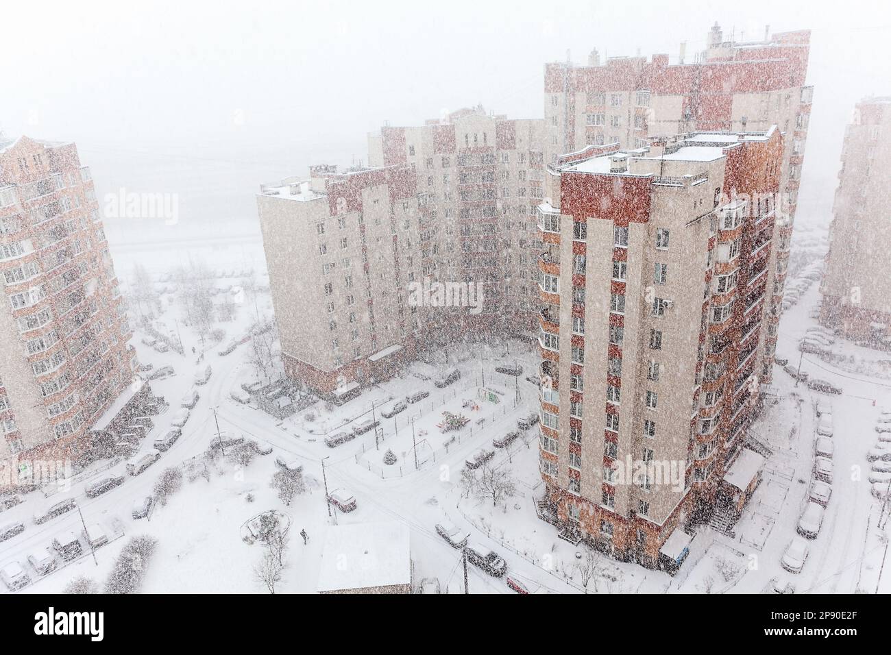 Heavy snowfall in the courtyard of a residential complex Stock Photo ...
