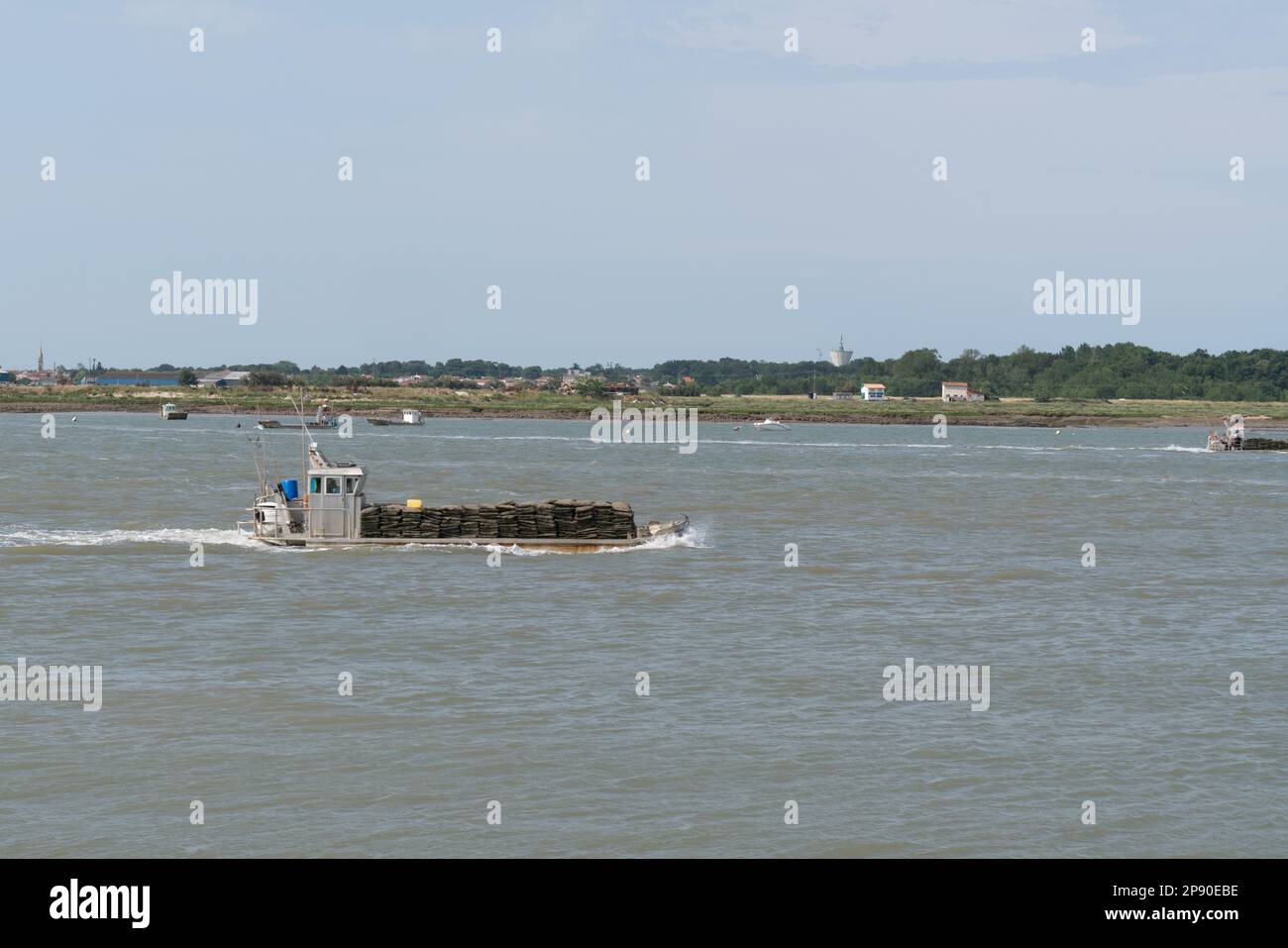 Oyster transport boat in Marennes d'oleron France Stock Photo - Alamy