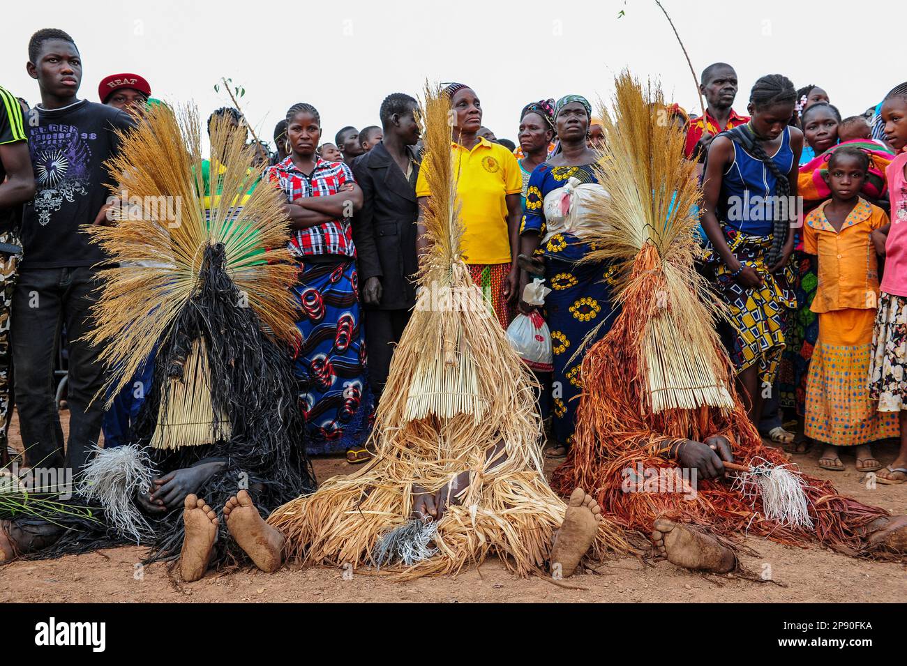 Fibre mask wearers resting in front of the crowds before their ...