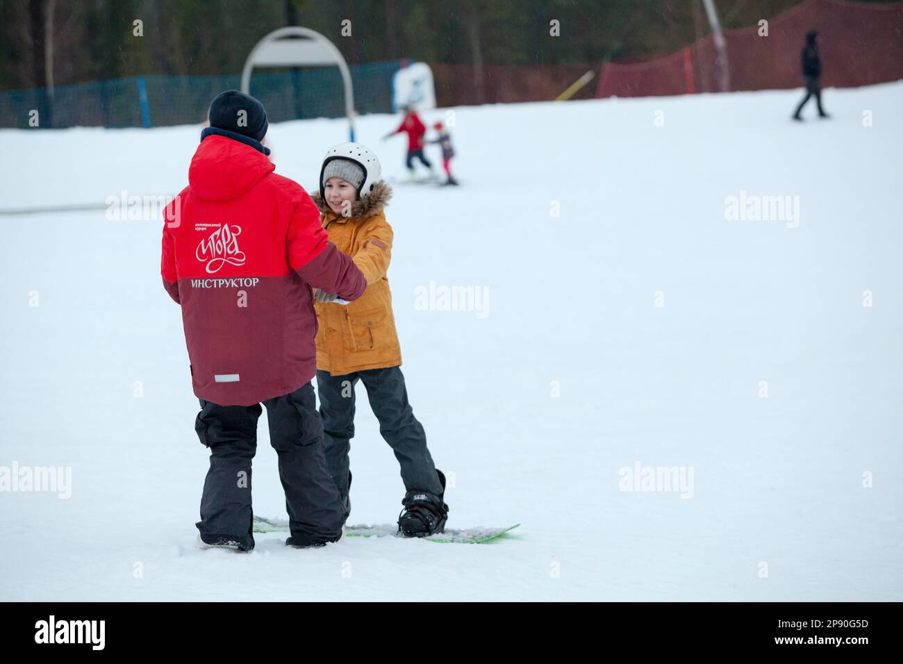 St. Petersburg, Russia-circa Jan, 2018: The instructor holds the child ...