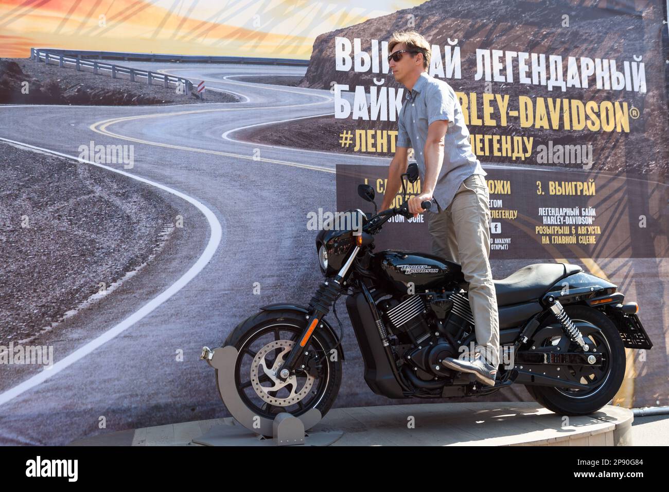 Saint-Petersburg, Russia-circa Aug, 2018: A man with glasses is ...
