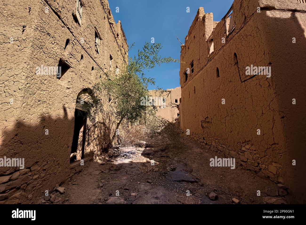 Falling down mud-brick ruins of the old village in Al Hamra, Oman Stock ...
