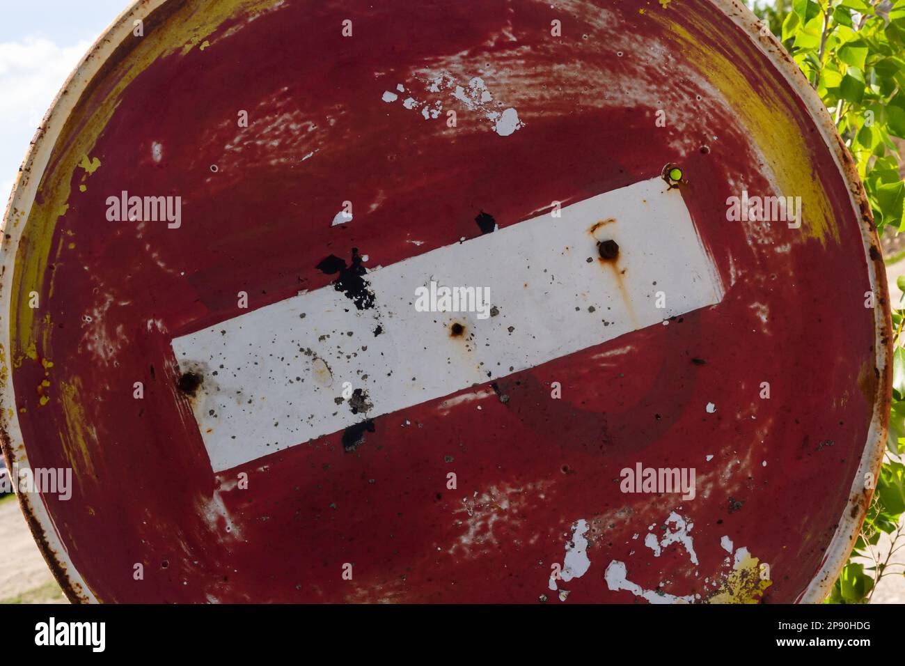 Weathered, scratched and dirty old red and white round No entry road ...