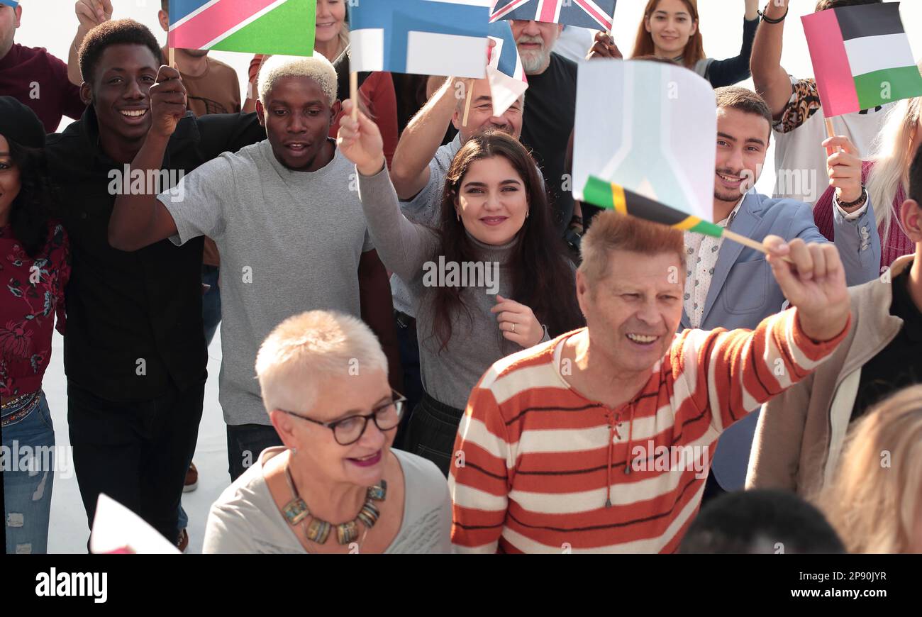 group of confident people with their national flags Stock Photo - Alamy