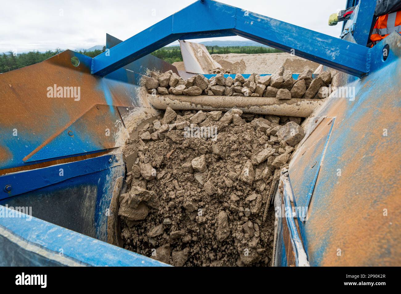 Industrial belt conveyor moving raw materials from mine Stock Photo - Alamy