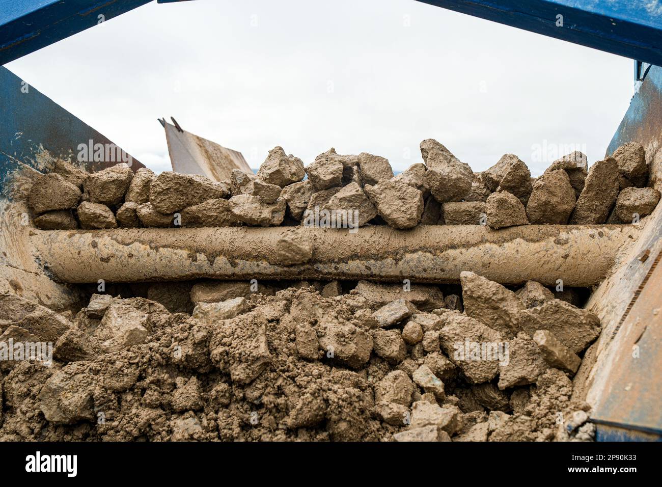 Industrial belt conveyor moving raw materials from mine Stock Photo - Alamy