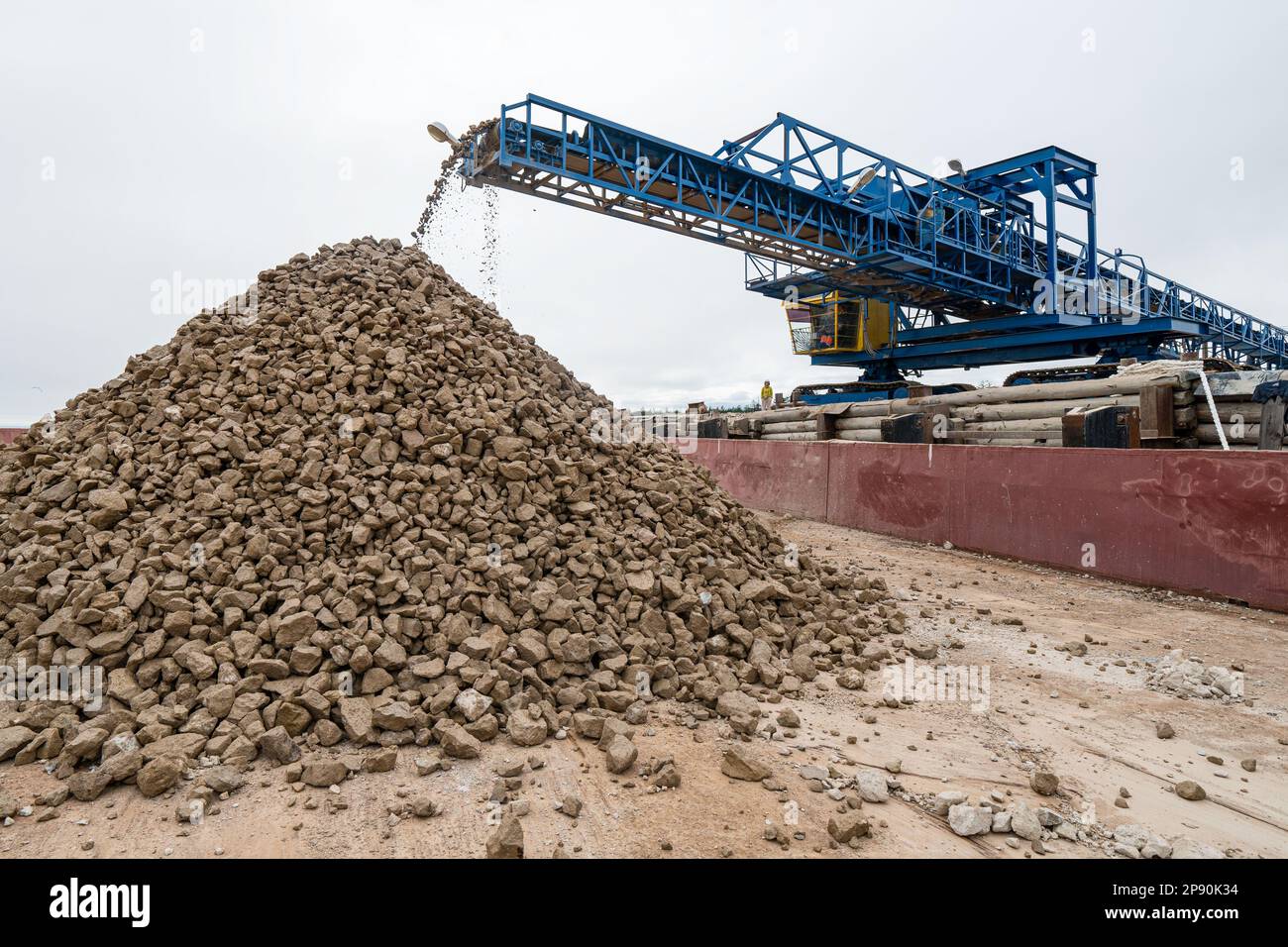 Industrial belt conveyor moving raw materials from mine Stock Photo - Alamy