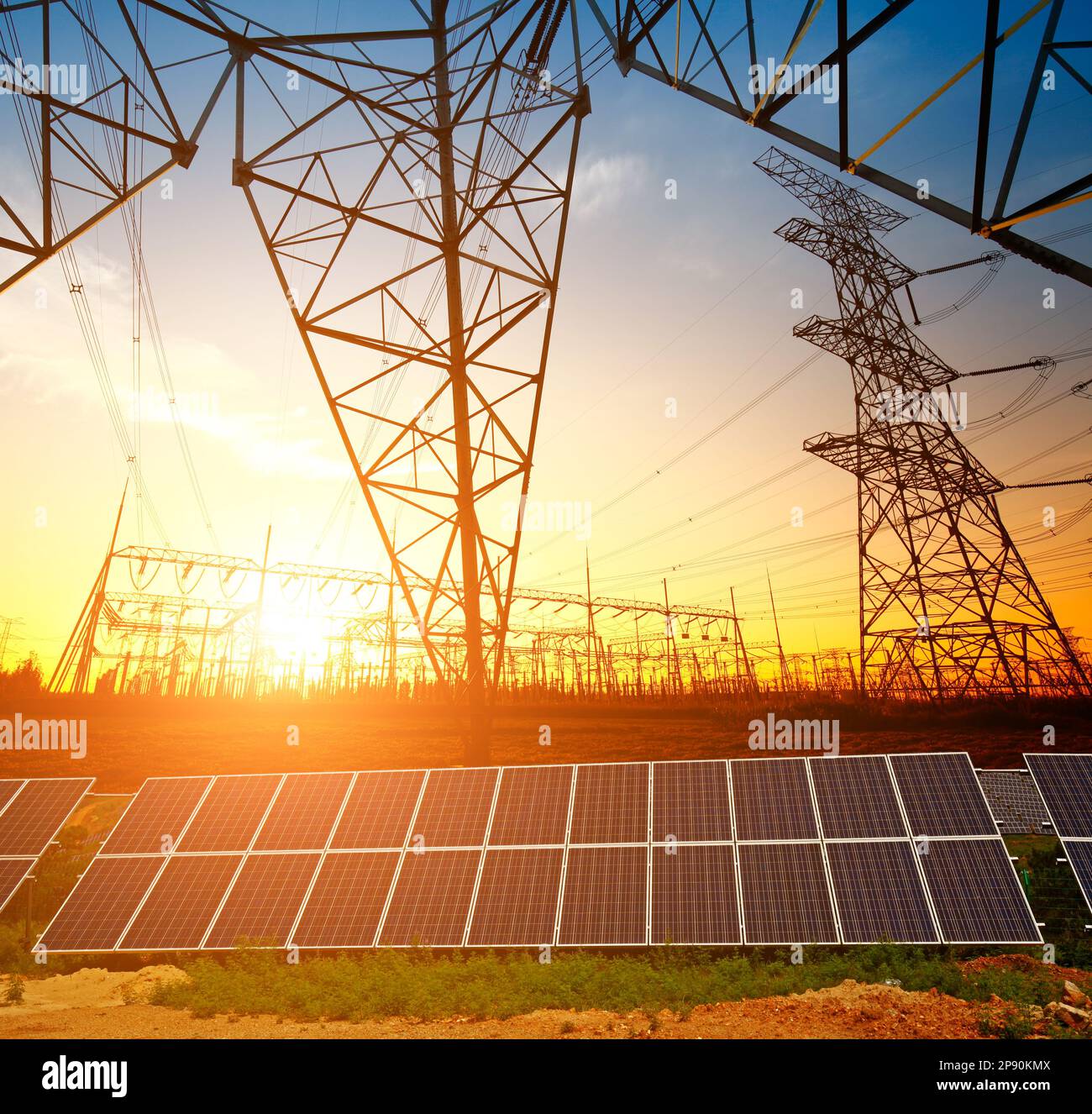 Solar panels and pylon, green environmental protection Stock Photo - Alamy