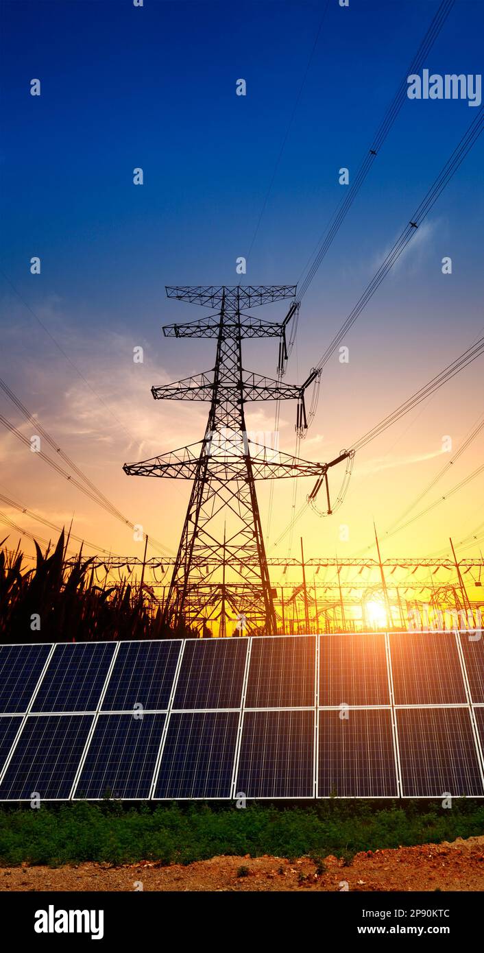 Solar panels and pylon, green environmental protection Stock Photo - Alamy