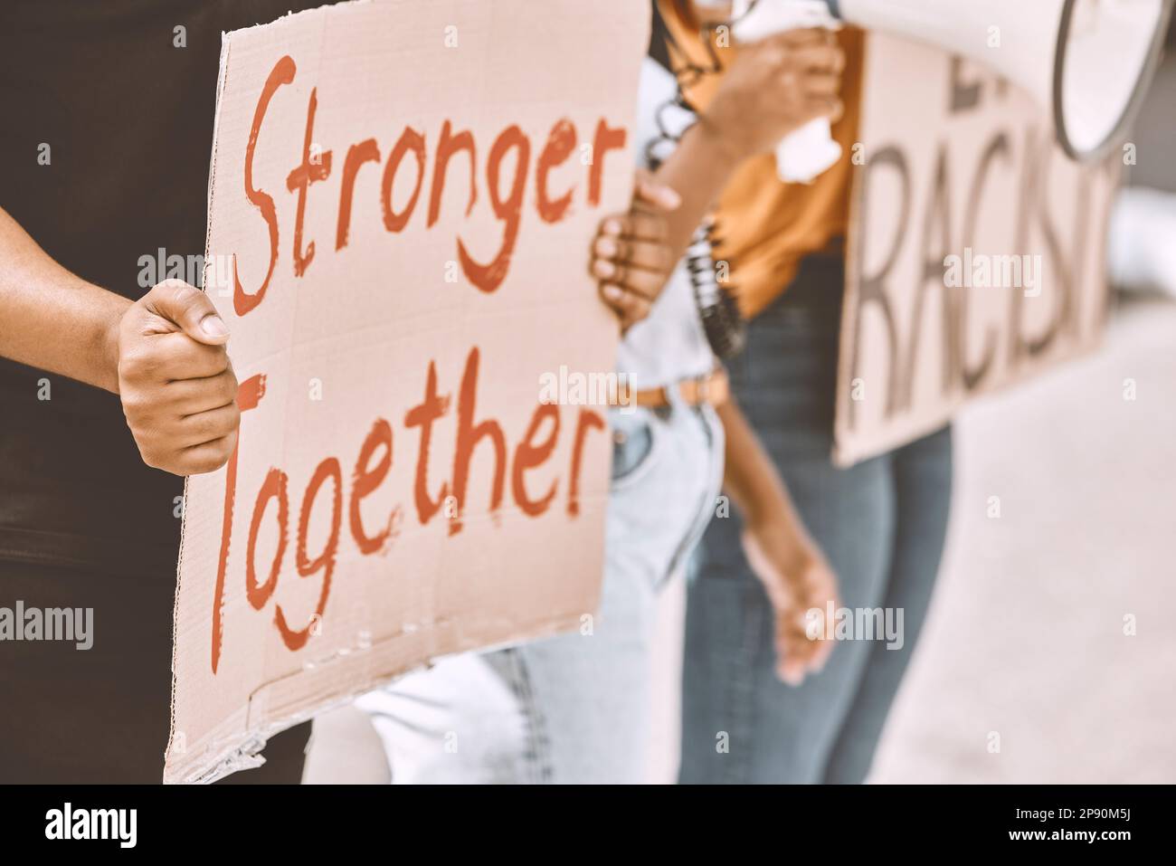 Protest, sign and equality with a group of people holding cardboard ...