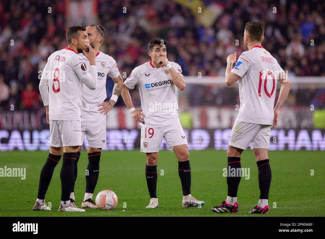 Seville, Spain. 09th Mar, 2023. Marcos Acuna (19), Joan Jordan (8) and ...