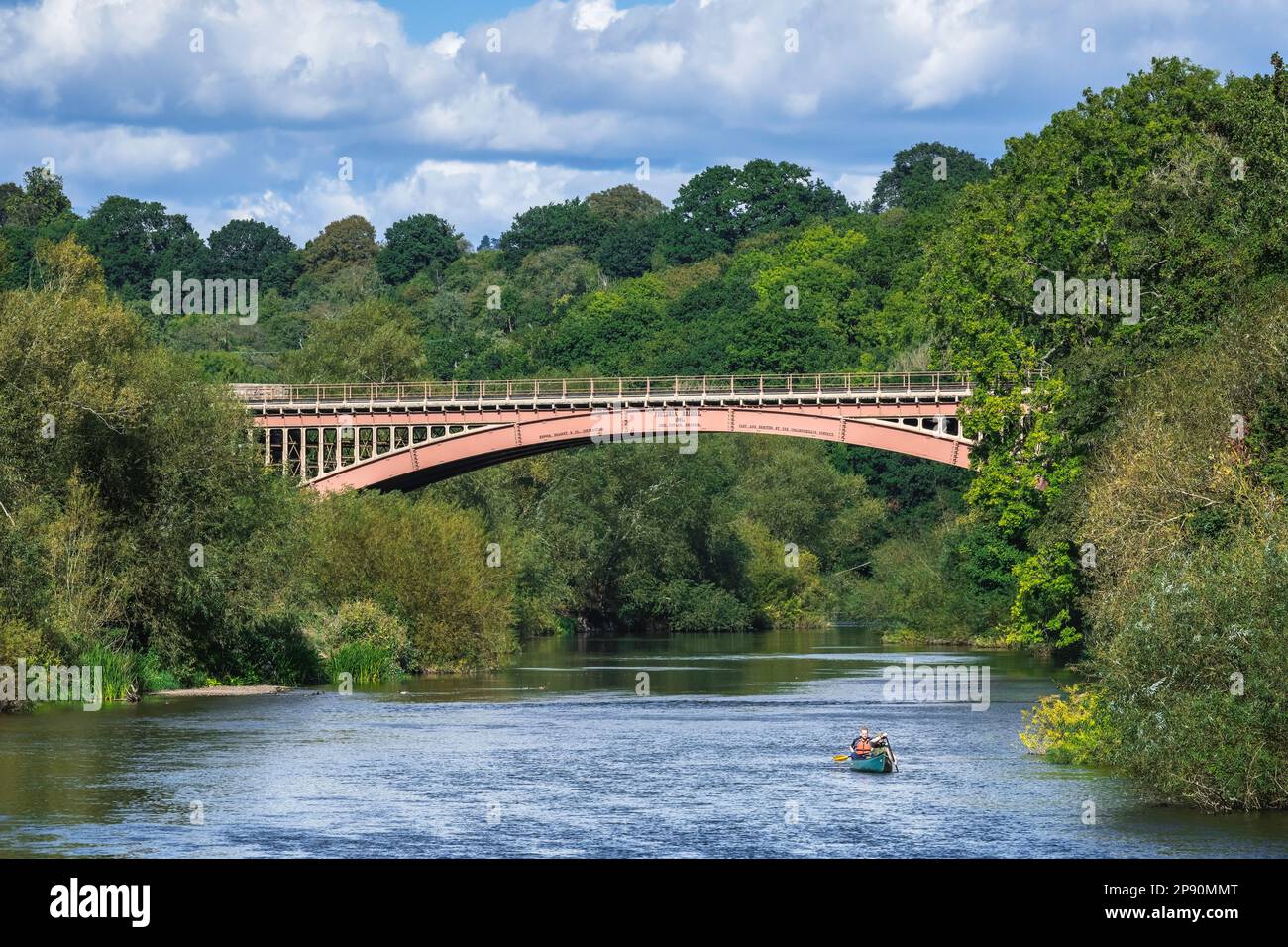 Couple ride the kayaking pass the Victoria Bridge at Arley and Bewdley ...