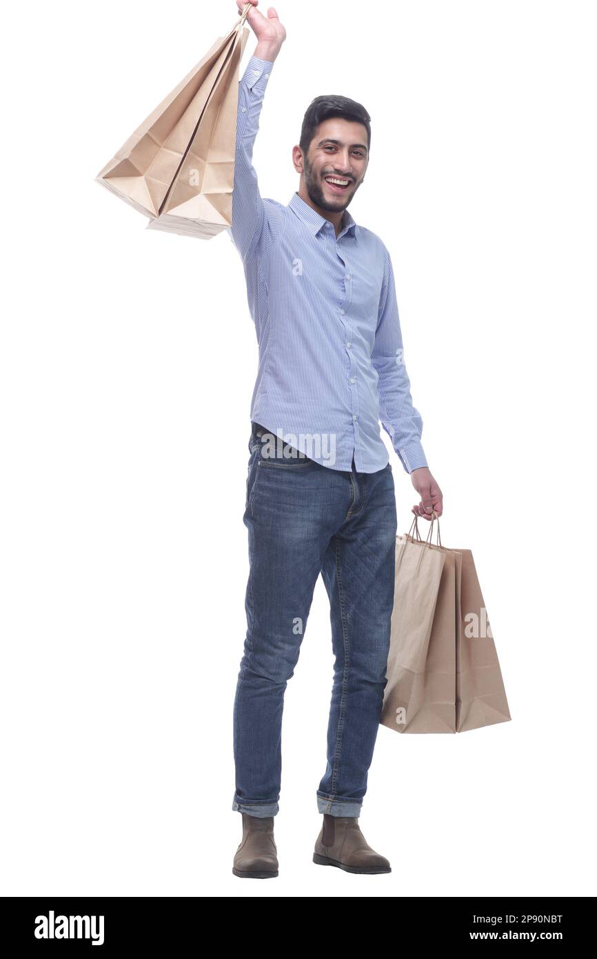 in full growth. happy man showing his purchases Stock Photo - Alamy