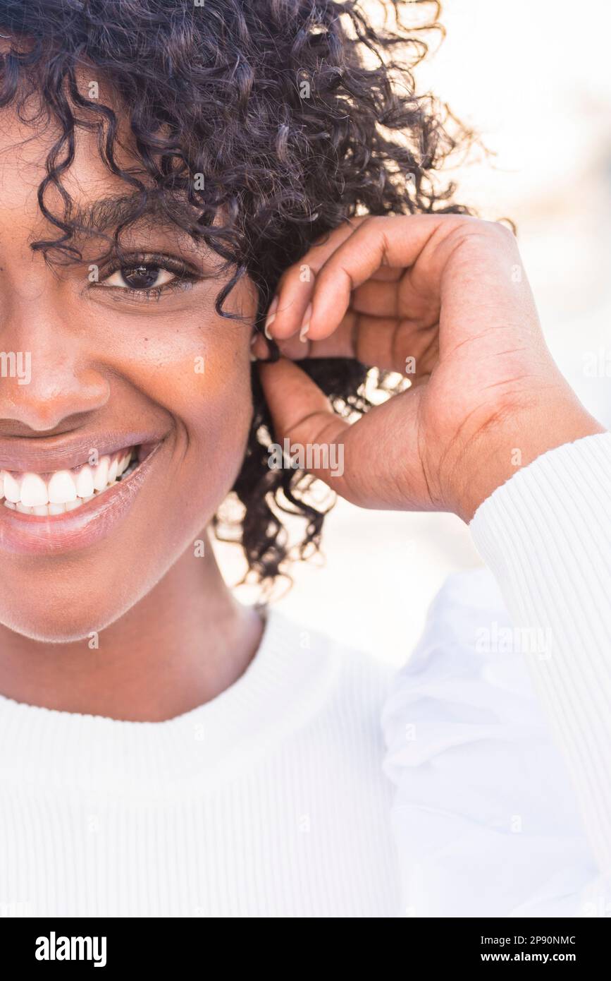 Cut half face composition image with attractive young black girl ...