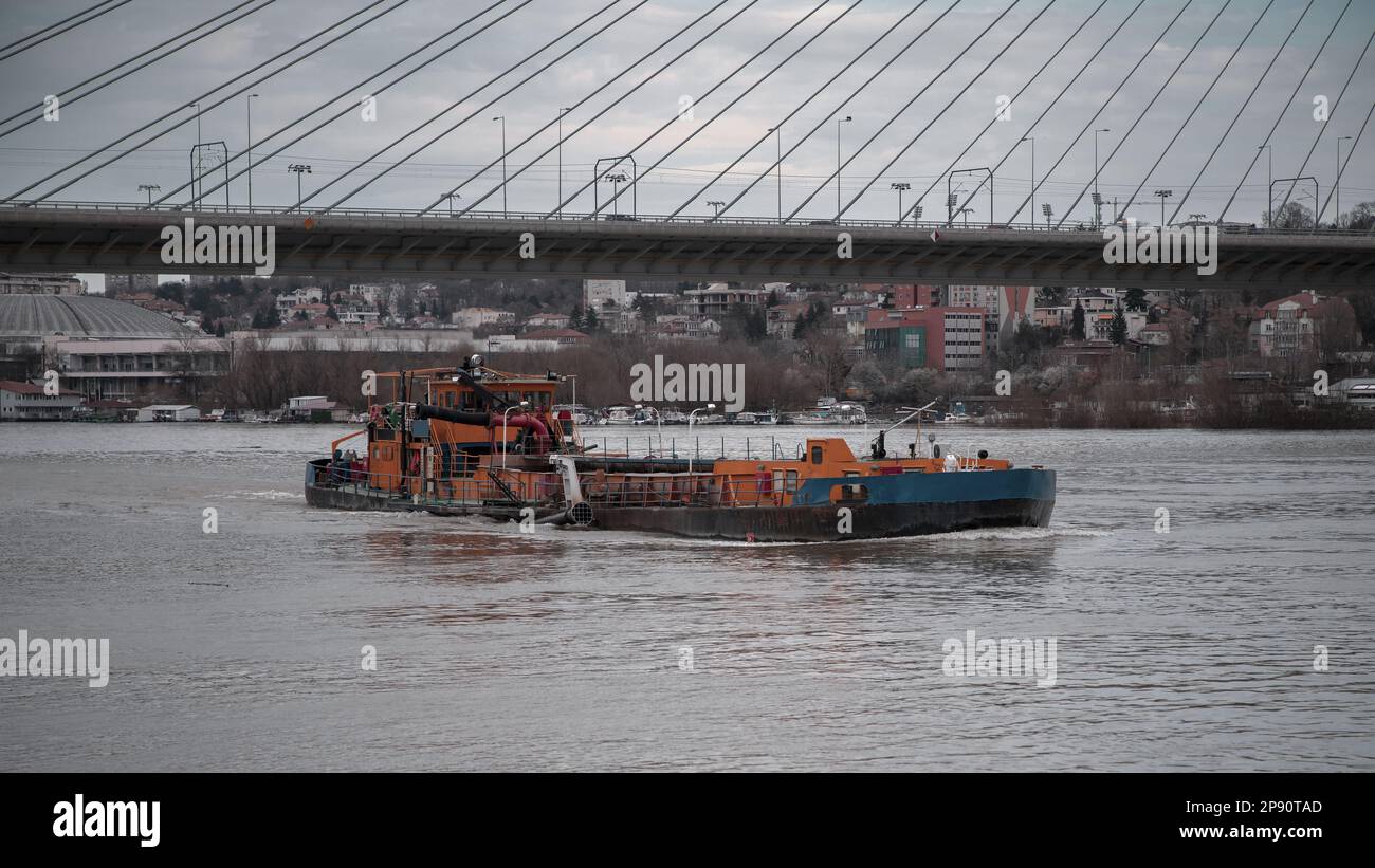 A river barge sailing along the river upstream Stock Photo - Alamy